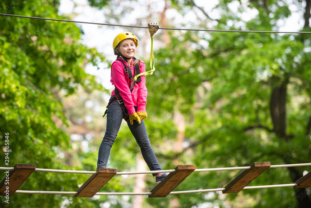 Child boy having fun at adventure park. Cute child boy. Adventure ...