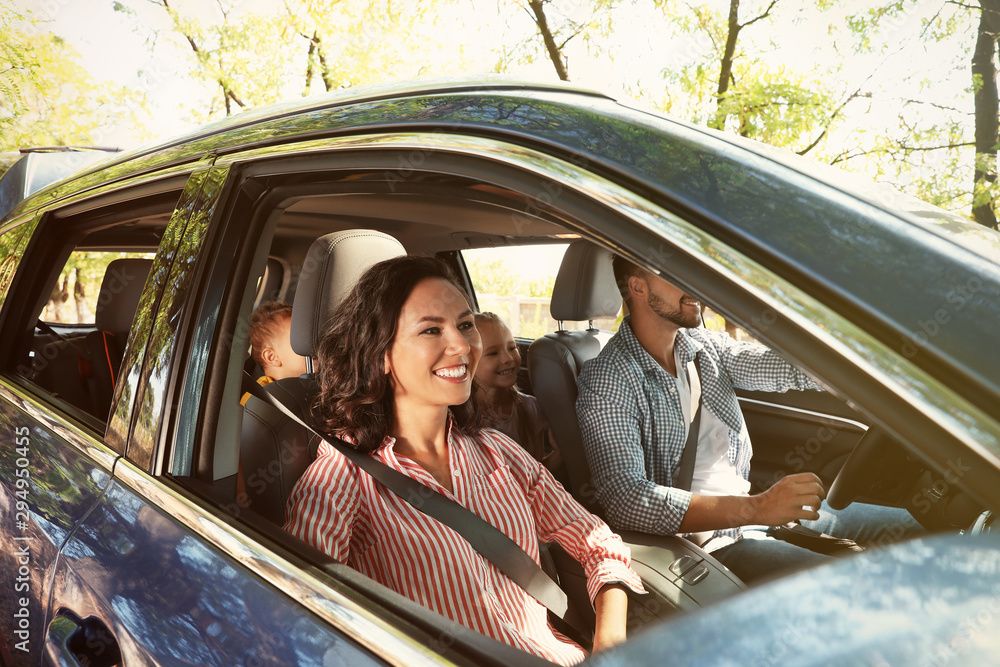 Happy family in car on road trip Stock Photo | Adobe Stock