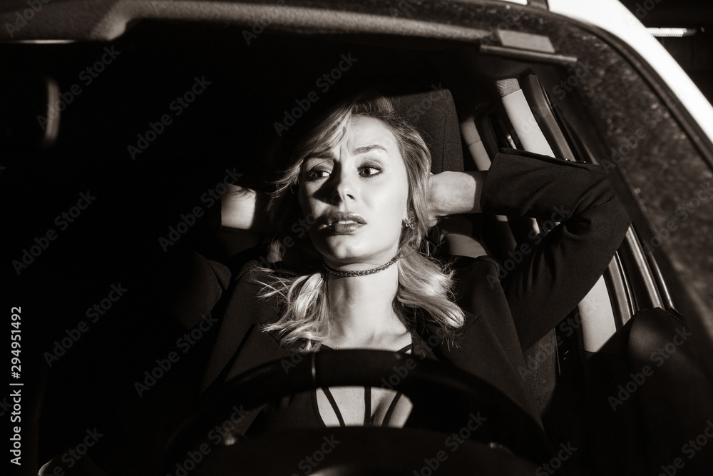 Scene from a detective series. Killer strangles business woman in her ...