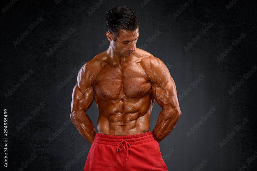 Handsome Muscular Men Posing and Flexing Muscles Stock Photo | Adobe Stock