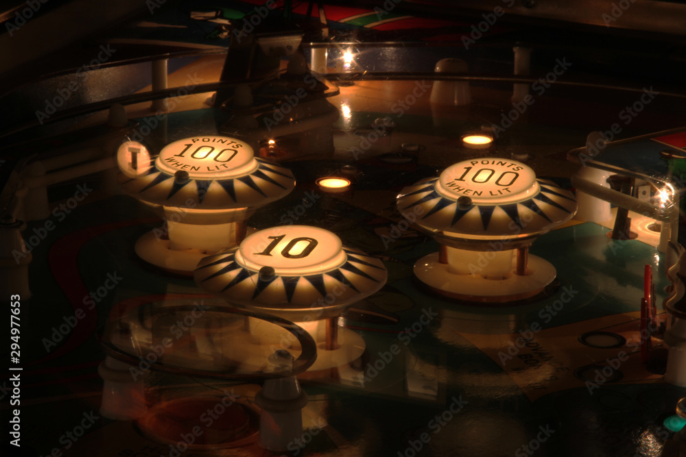 Pinball bumper and coin slot Stock Photo | Adobe Stock