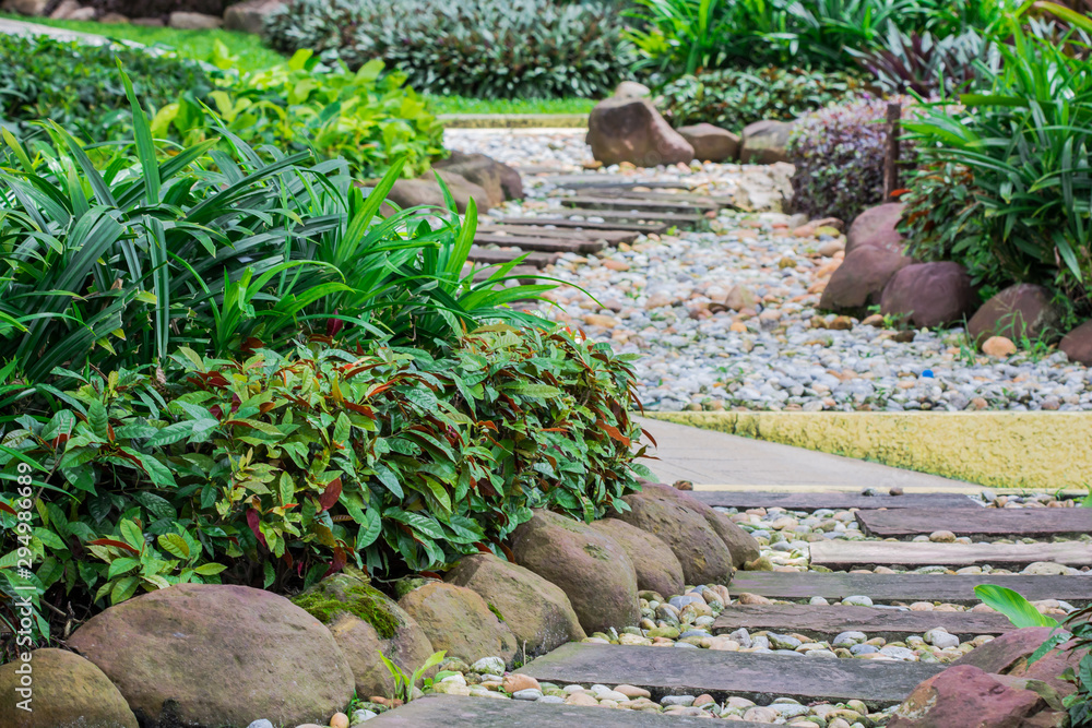 Landscaping in the garden and The path in the garden. Stock Photo ...