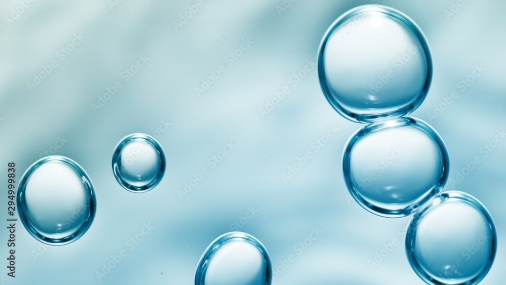 transparent gas bubbles on water surface. Worms-eye low angle with ...
