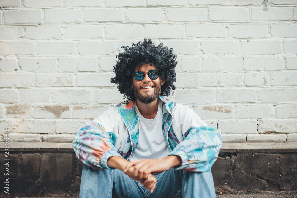 Stylish young man in a retro jacket. Fashion trends of 90s. Handsome ...