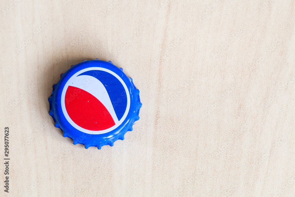 MOSCOW, RUSSIA - APRIL 4, 2019: used crown cork bottle cap from Pepsi ...