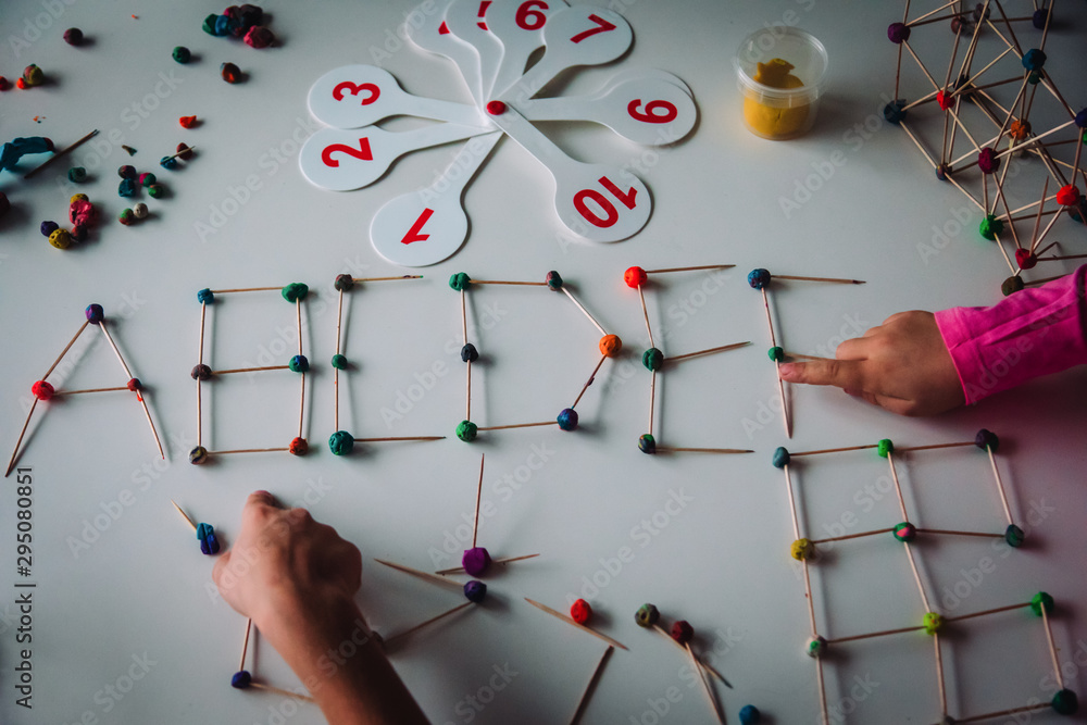 kids making letters and geometric shapes from clay and sticks ...