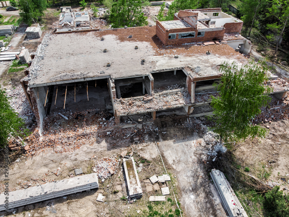 Aerial drone view of old demolished industrial building. Pile of ...