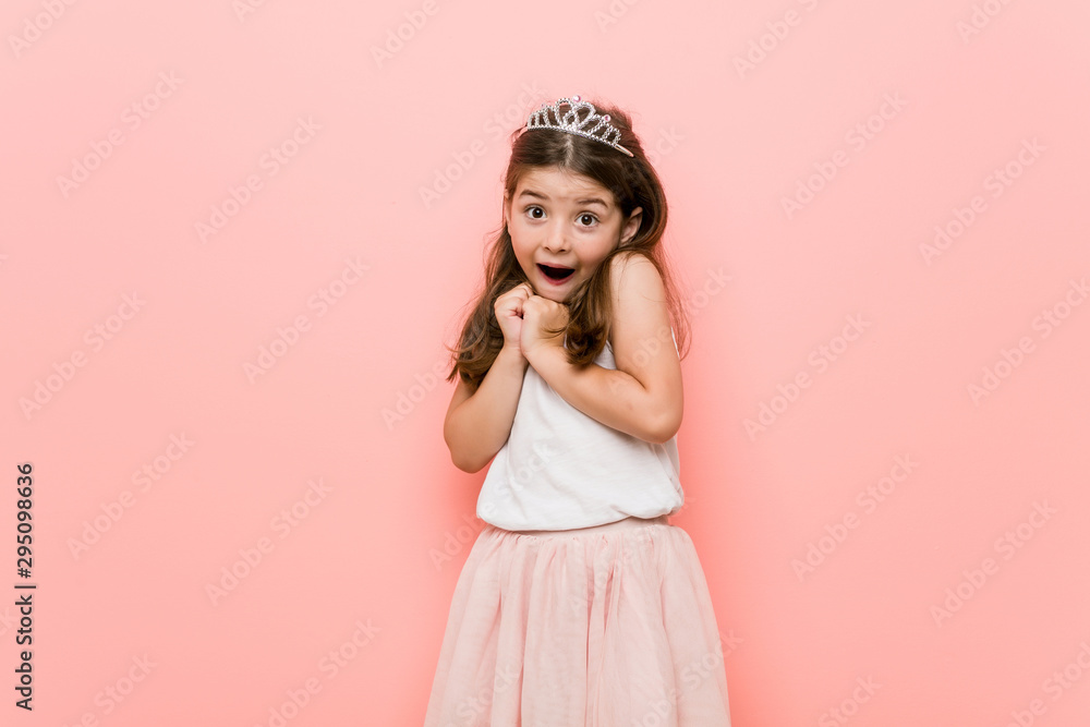 Little girl wearing a princess look scared and afraid. Stock Photo ...