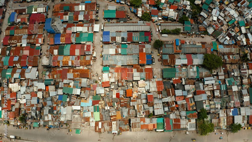 Dense building houses in the slums of Manila top view. Overpopulated ...
