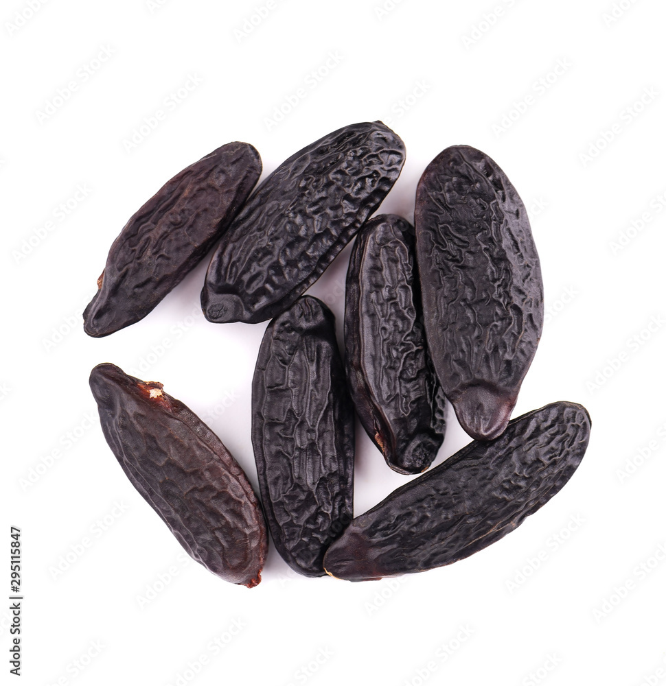 Tonka beans isolated on white background. Bean of Dipteryx odorata ...