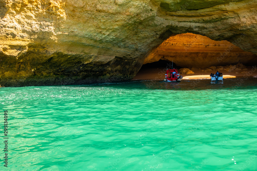 The famous Benagil cave (Algar de Benagil) is accessible only by water ...