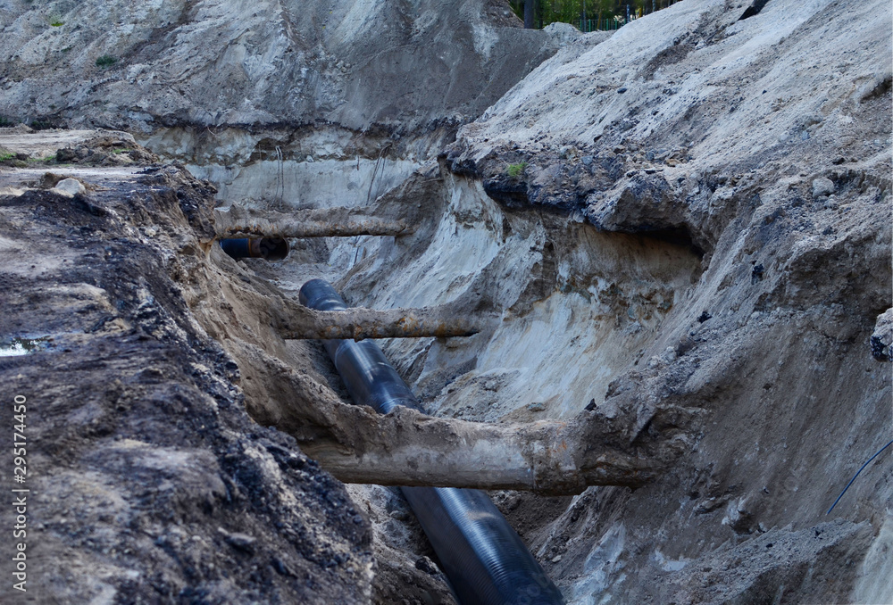 Natural gas pipeline construction work. A dug trench in the ground for ...
