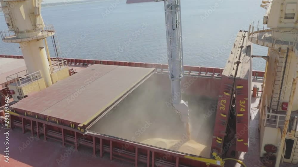 loading wheat into a tanker, a ship with wheat. Loading grain into a ...