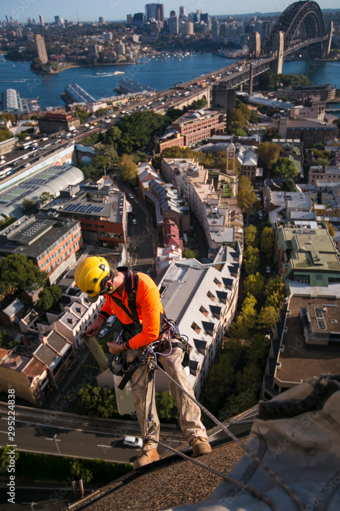 Rope access abseiler repairer windows cleaning wearing fall body safety ...
