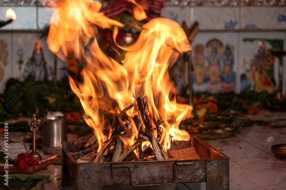 Offering prayer to God in front of holy fire Stock Photo | Adobe Stock
