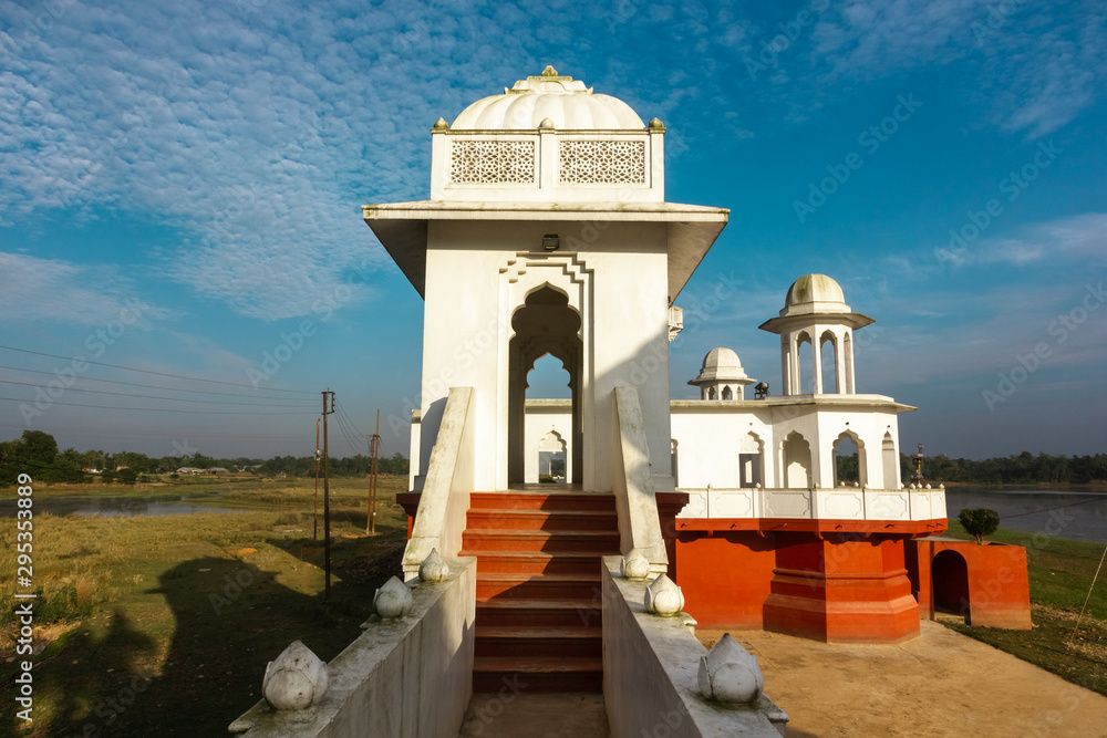 The red and white architecture of the Neermahal water palace on the ...
