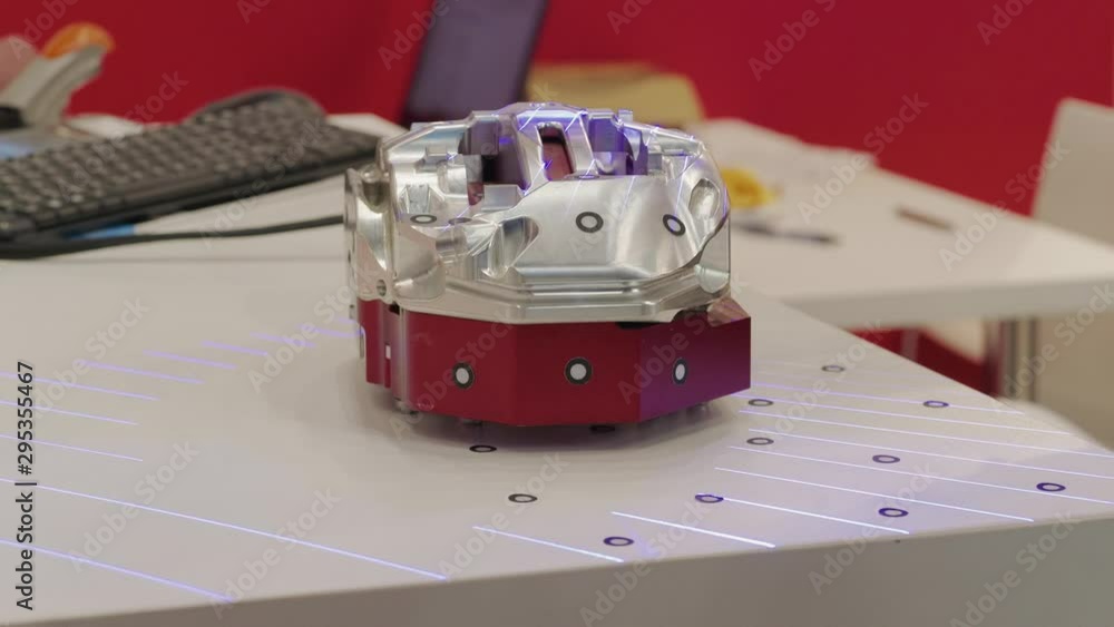 Manual scanning detail by 3D scanner on laboratory table with computer ...