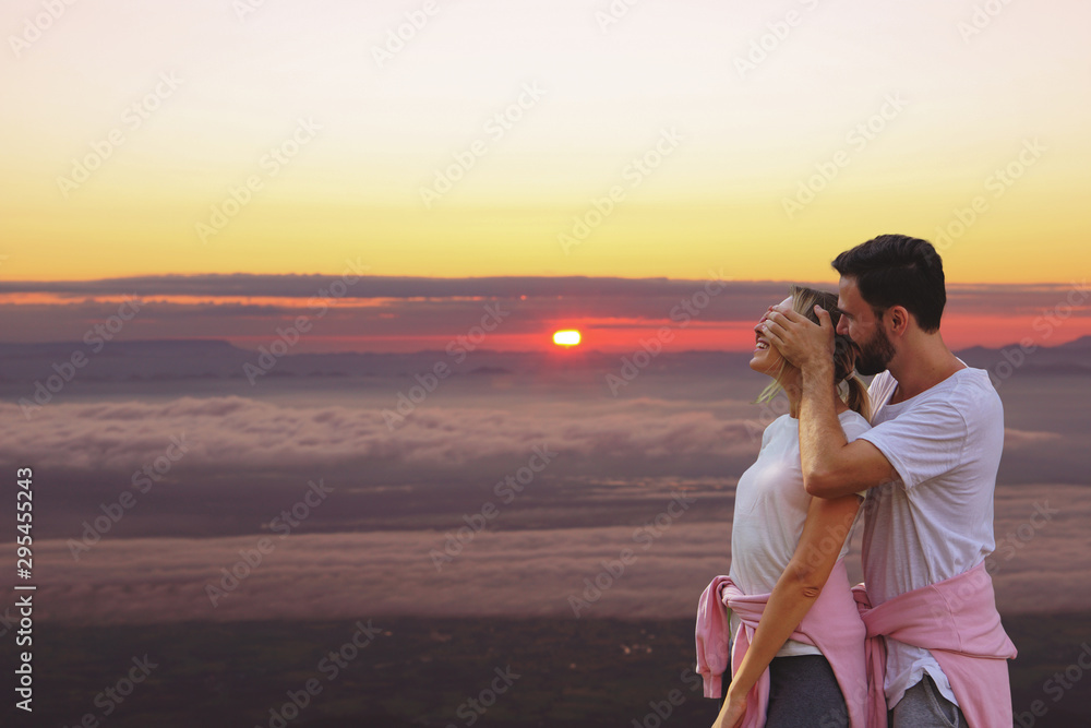 Couples on a scenic spot,view point by a young man are closing the eyes ...