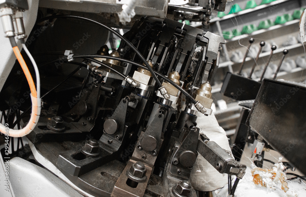 Man use special machine tool for making a shoes. The conveyor on a ...