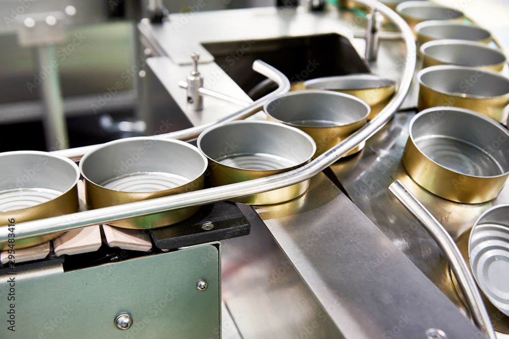 Empty cans on conveyor of food factory Stock Photo | Adobe Stock