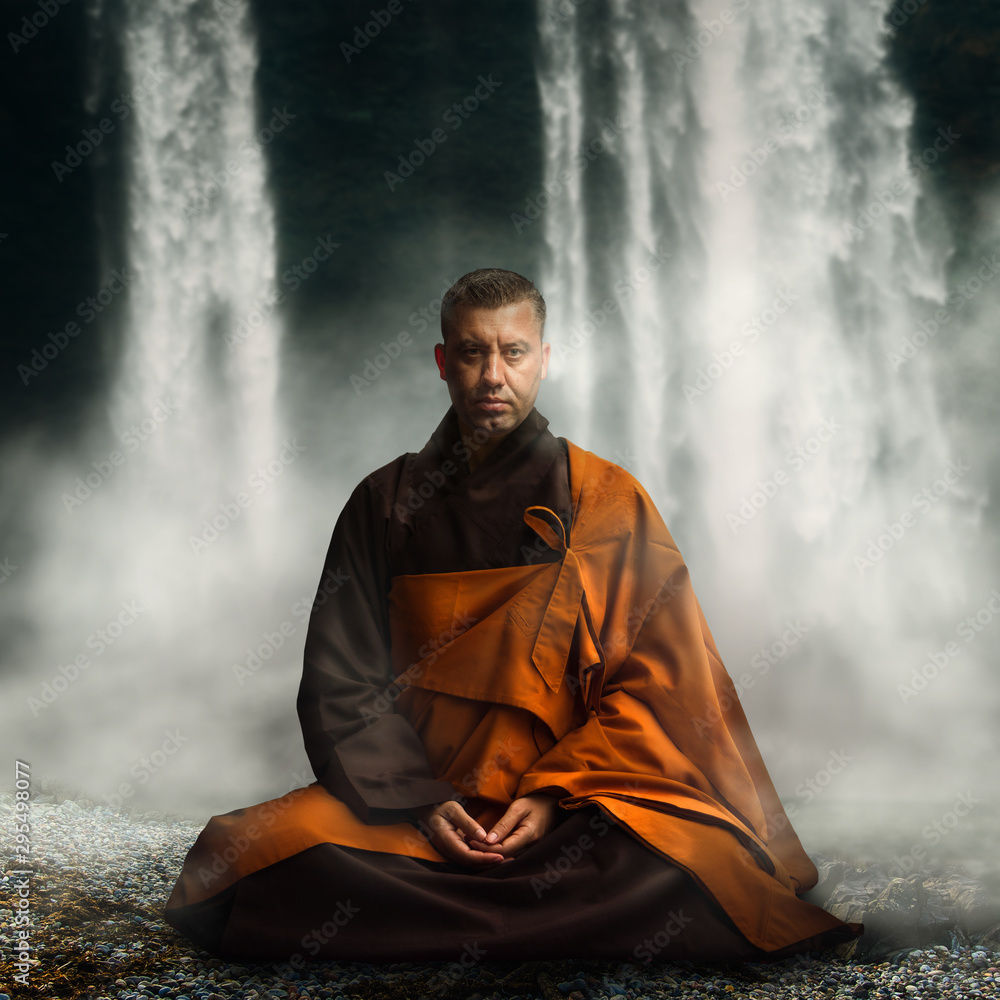 Buddhist monk in lotus position. Stock Photo | Adobe Stock