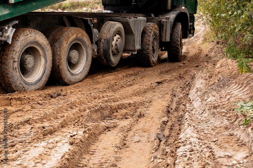 Five axles of a 70 ton dump truck with large off-road wheels Stock ...