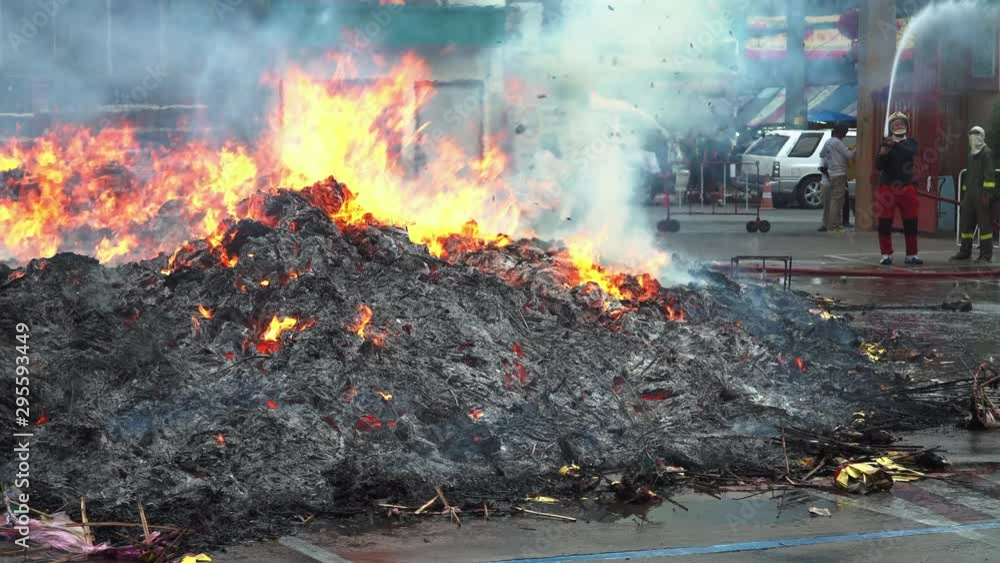 Texture of burning joss paper known as ghost money in ceremony faith of ...