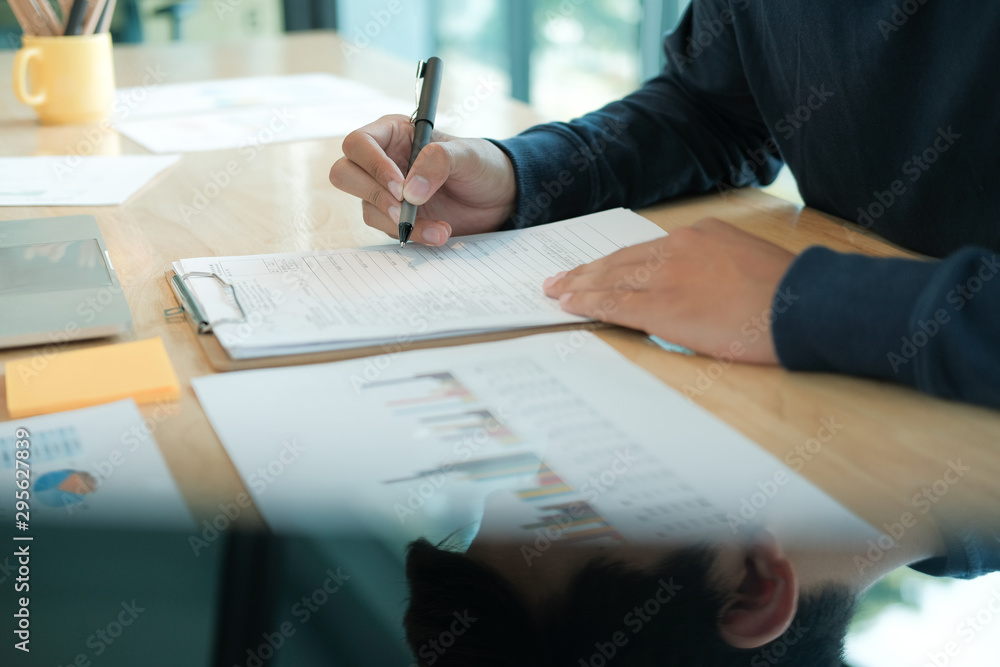 applicant fill out application form. man signing contract agreement ...