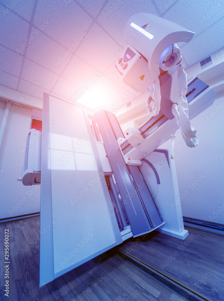X-ray room in a hospital. Classic ceiling-mounted x-ray system. Stock ...