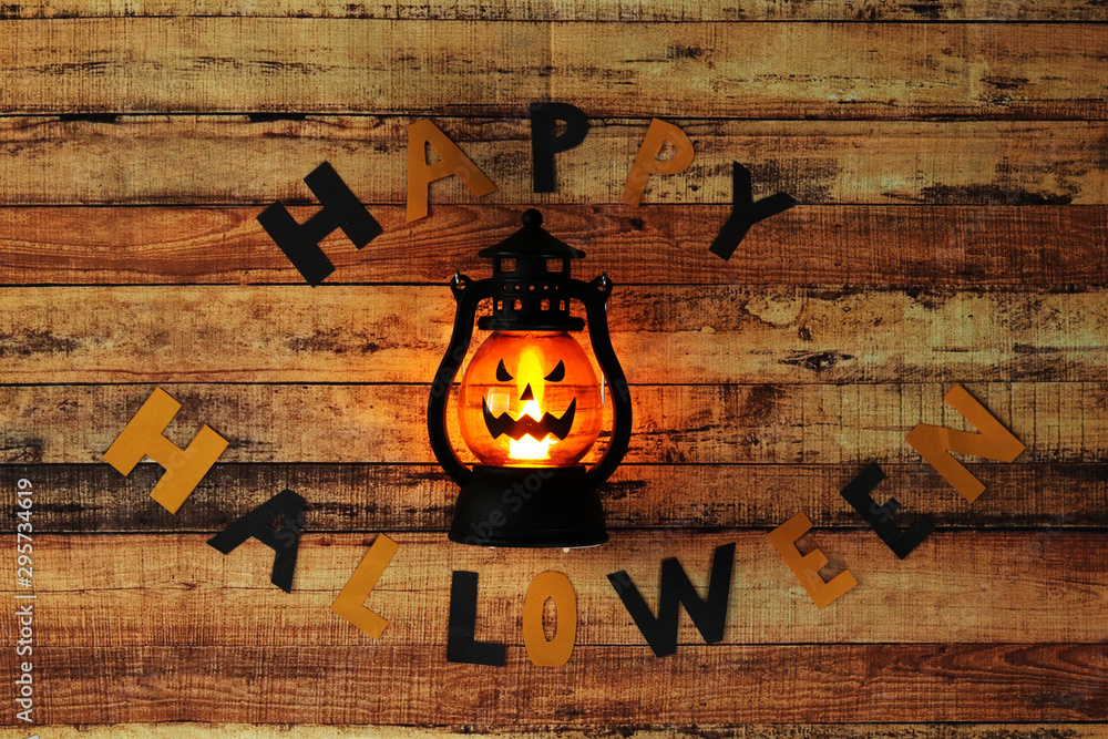 Scary jack of lantern for ominous atmosphere. Word Happy Halloween ...