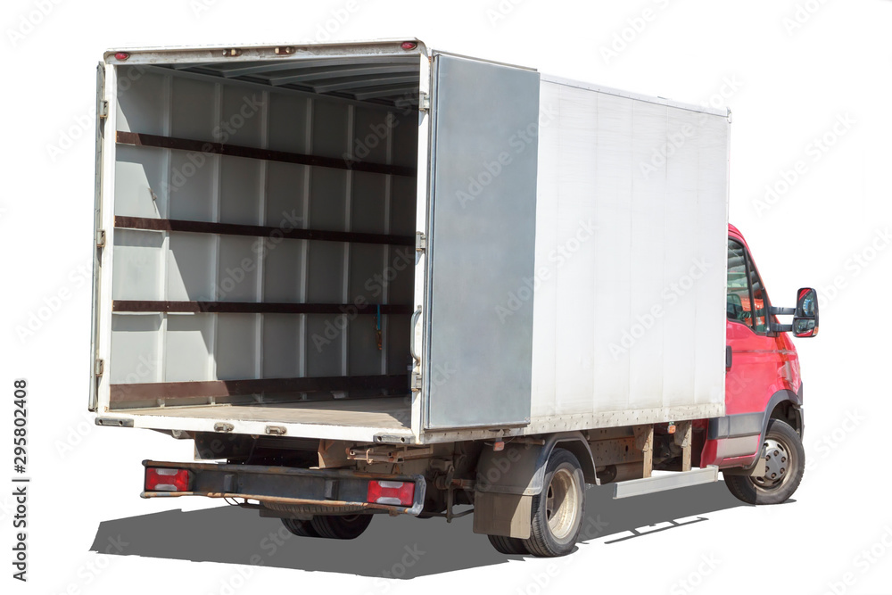 small truck with red cab stands with open empty body ready for loading ...