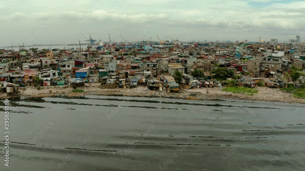Slums in Manila, a top view. Sea pollution by household waste. Plastic ...