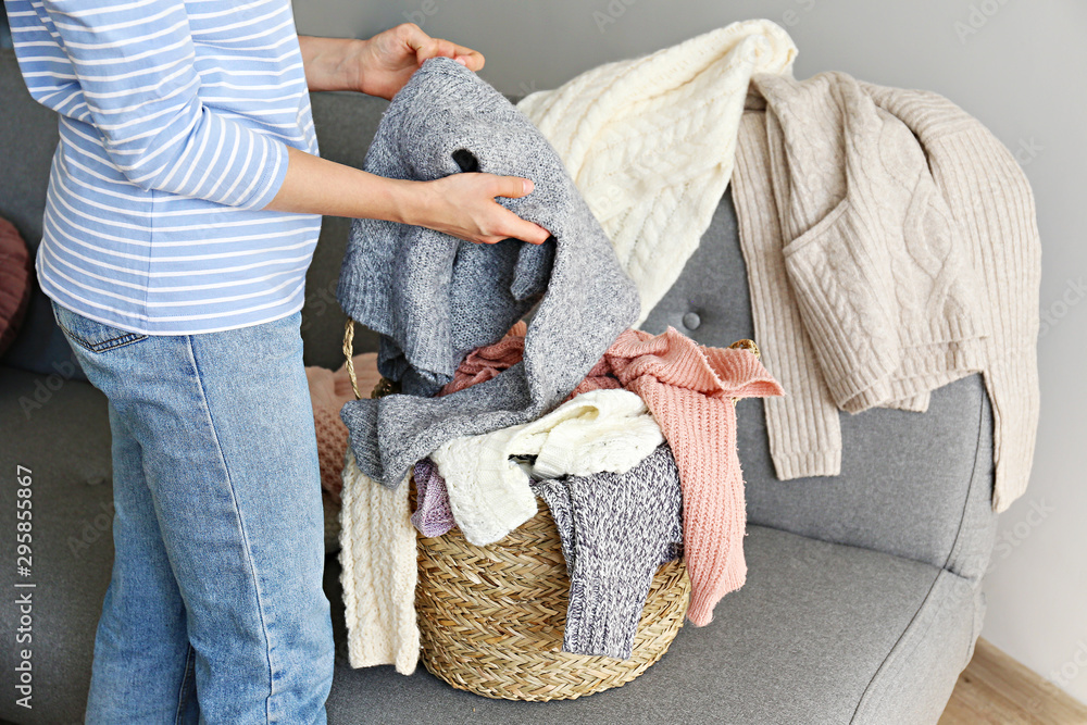 Categorizing winter laundry concept. A messy pile of kniwear lying on ...