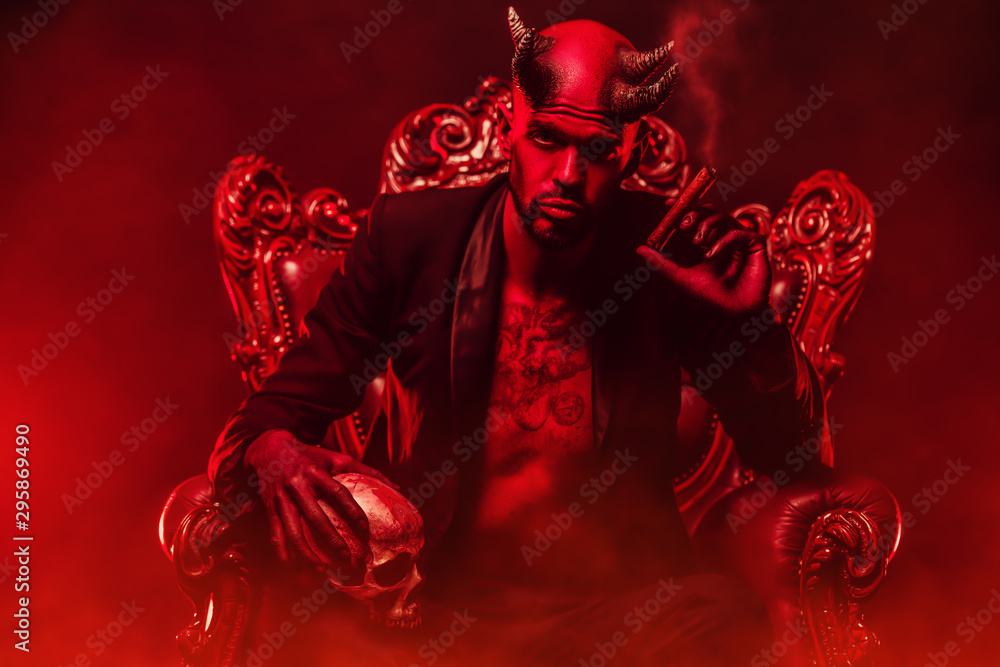 red devil on the throne Stock Photo | Adobe Stock