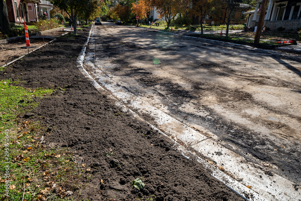 Sidewalk under construction in a residential neighborhood. Walking path ...