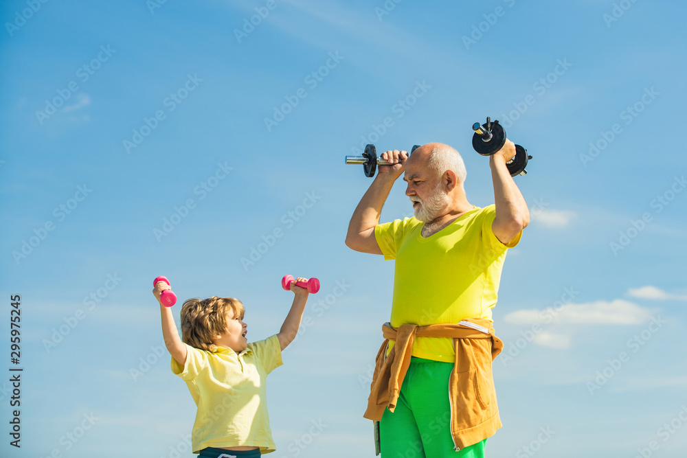 Sport exercise for kids. Boy is doing exercises to develop muscles ...