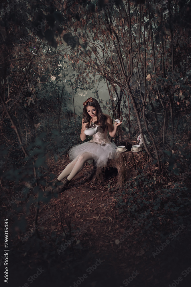 Beautiful girl in a fairy tale Alice in Wonderland Stock Photo | Adobe ...
