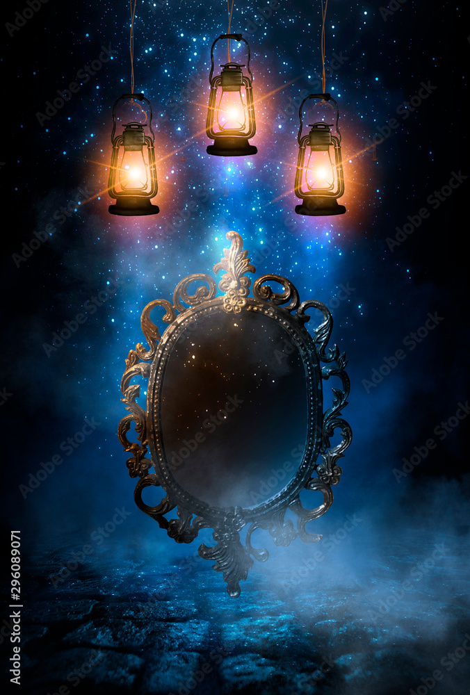 Dark night magic scene. Magic old mirror in a metal frame, night ...