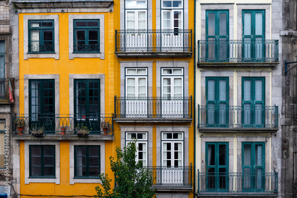 The facade of traditional building with beautiful windows at the Baixa ...
