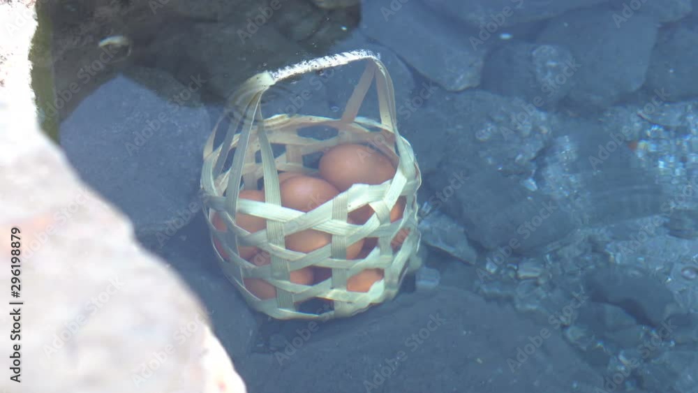 Egg baskets boiling in mineral hot springs at Chae son National Park ...