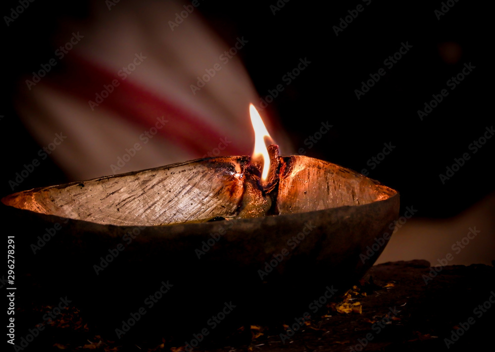 Burning Diya in a puja Stock Photo | Adobe Stock