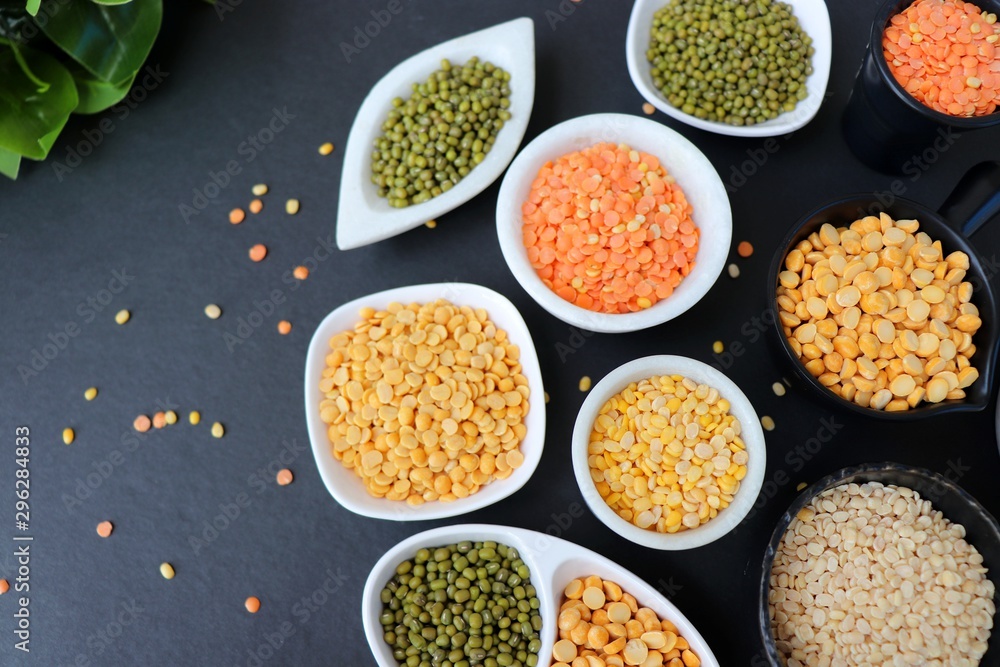 Composition of dry legumes. Assortment of colorful legumes in bowls ...