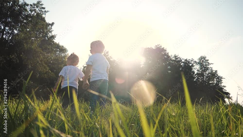 Happy family: funny slow motion video little kid boy hold hands play ...