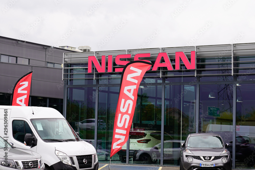 Nissan dealership sign logo front of car showroom Japanese brand Stock ...