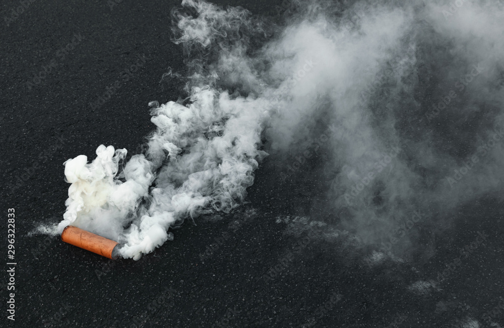 Fuming smoke bomb Stock Photo | Adobe Stock