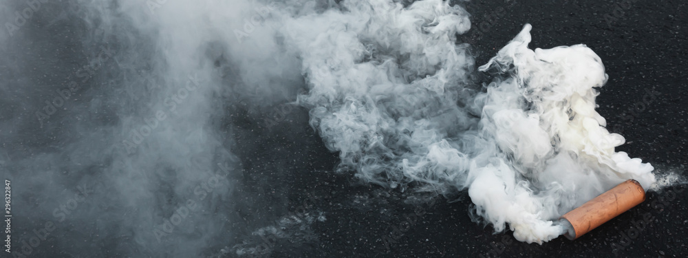 Fuming smoke bomb Stock Photo | Adobe Stock