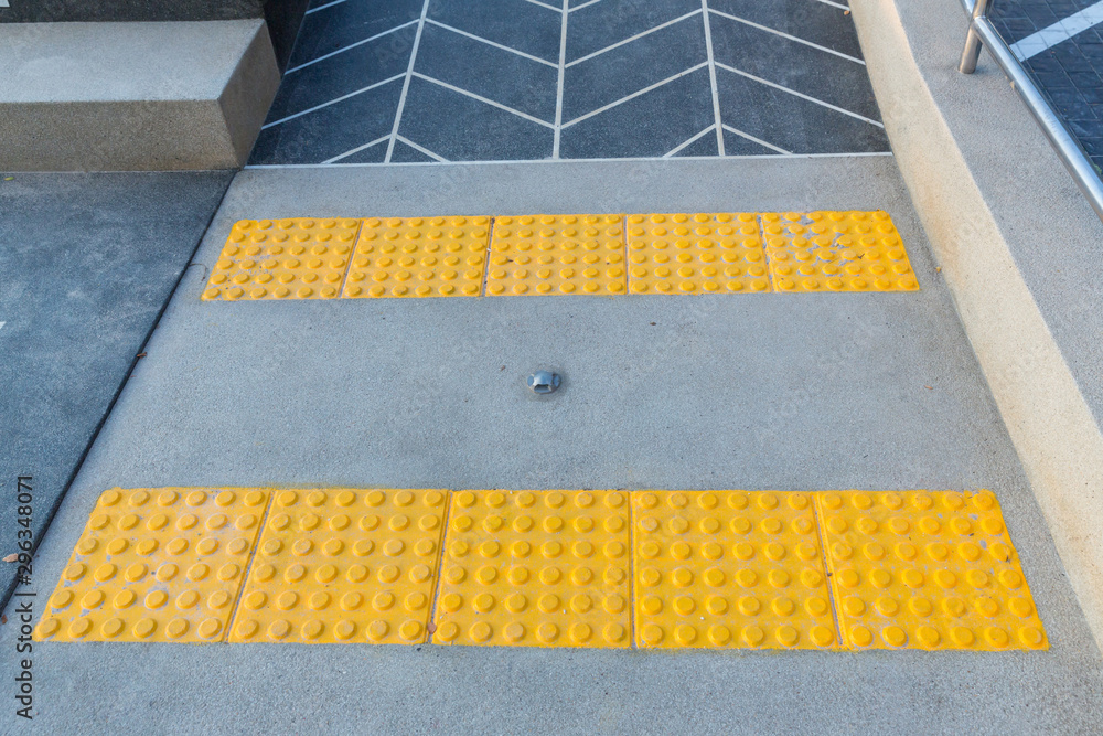 Concert ramp way with stainless steel handrail with disabled sign for ...