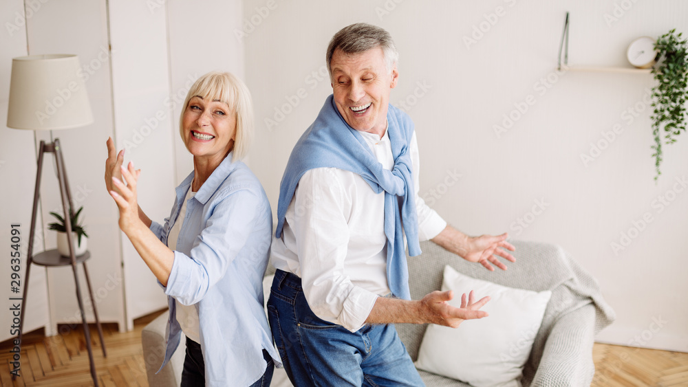 Joyful elder couple dancing at home, having fun Stock Photo | Adobe Stock