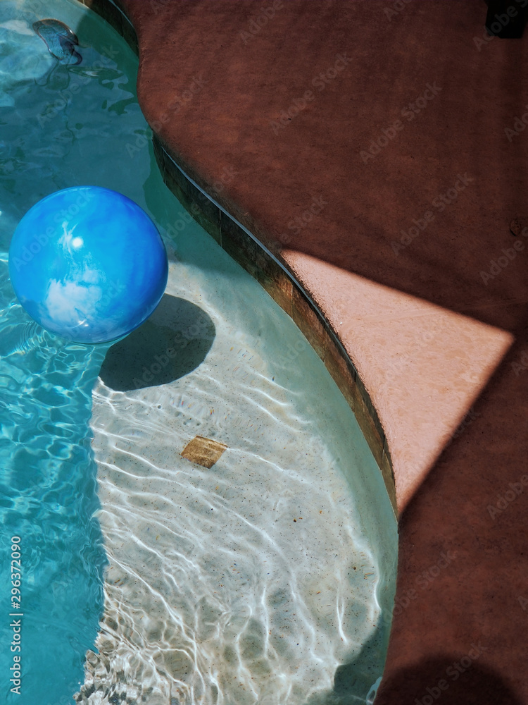 Giant blue ball in swimming pool Stock Photo | Adobe Stock