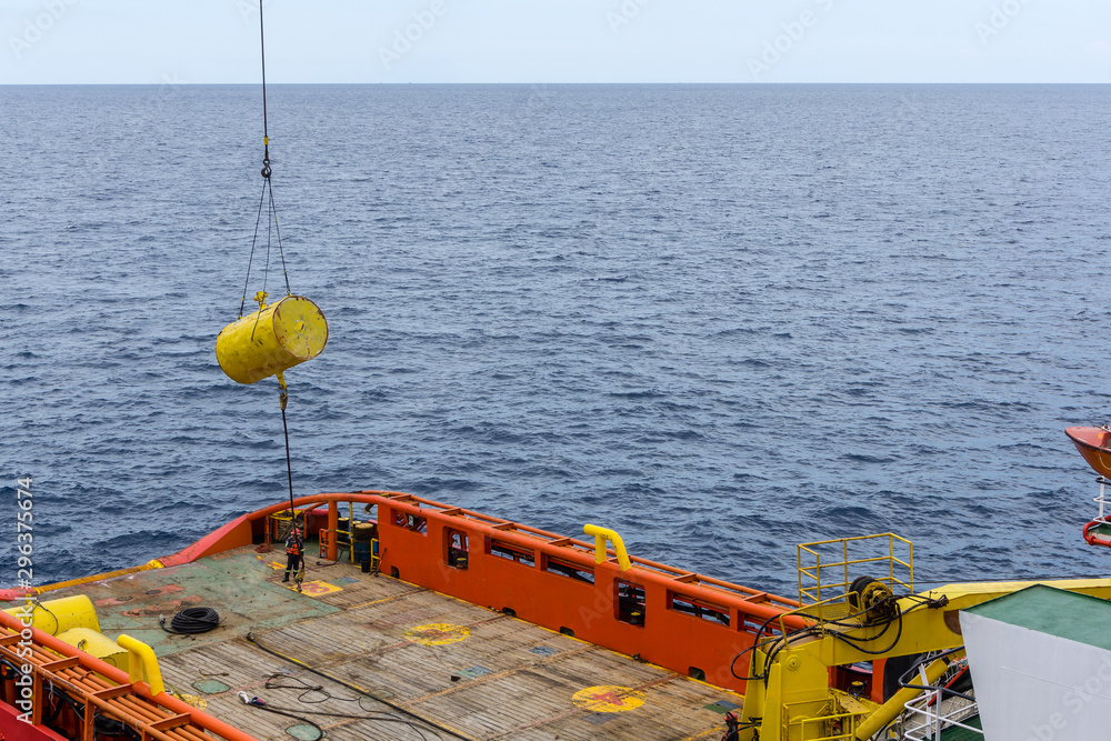 Anchor handling activities by a anchor handling tugboat for a ...
